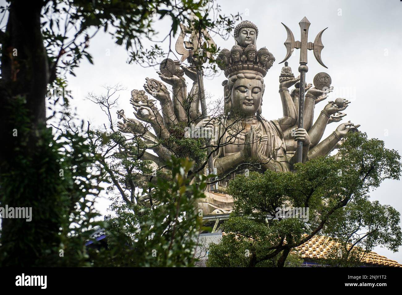 Taipei. 22nd Feb, 2023. Tourists visit the Thousand-Hand Guanyin Statue ...