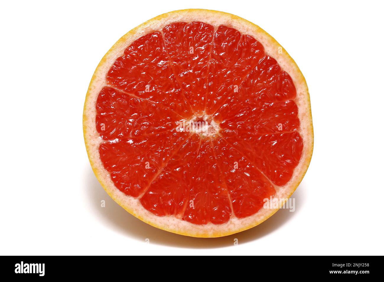 grapefruit (Citrus paradisi), halved grapefruit with red fruit pulp ...
