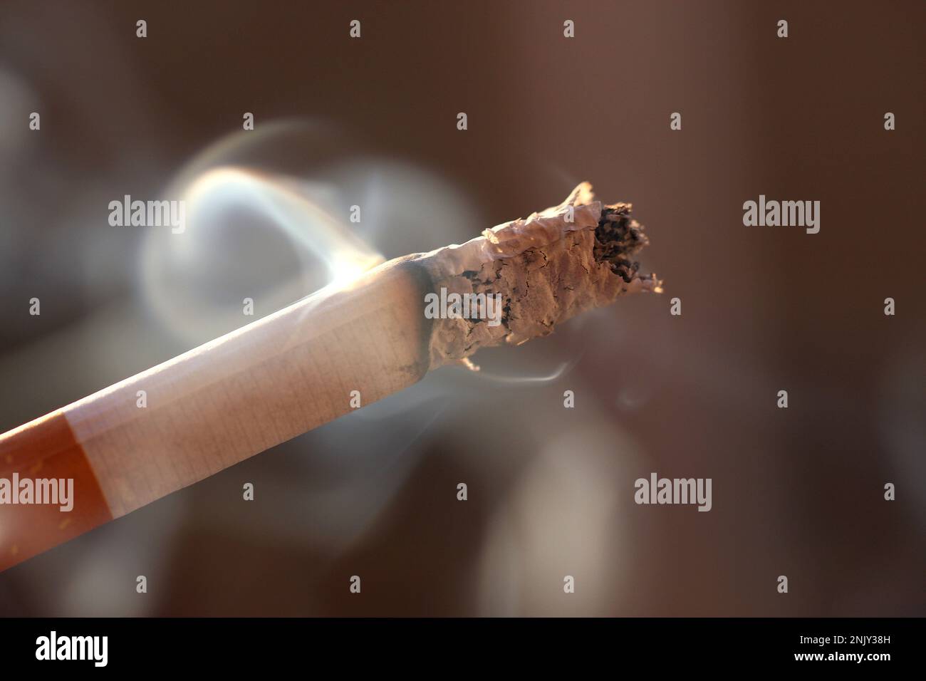 Cigarette horizontal hi-res stock photography and images - Alamy