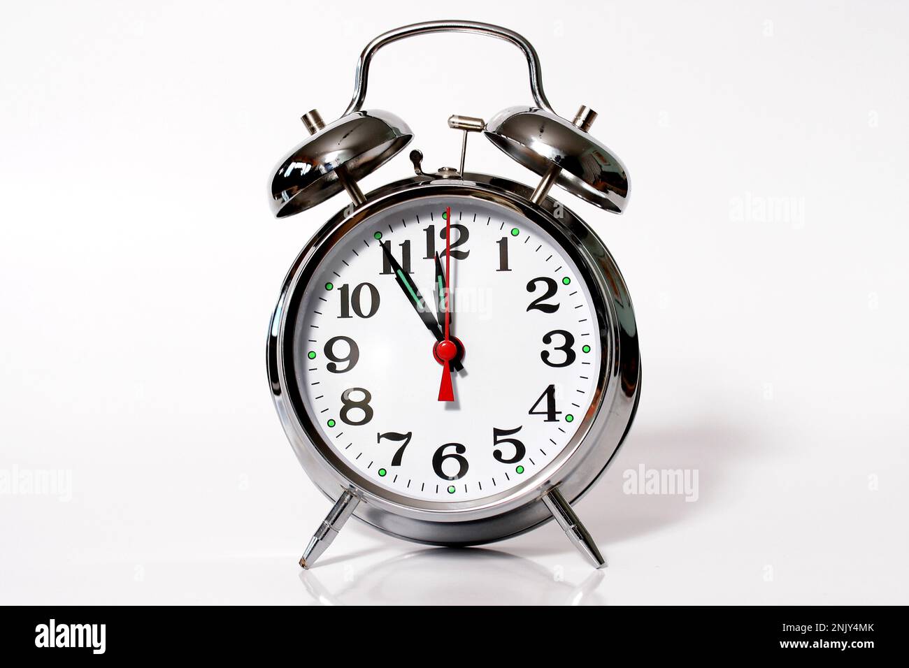 old alarm clock, 5 before 12 Stock Photo - Alamy