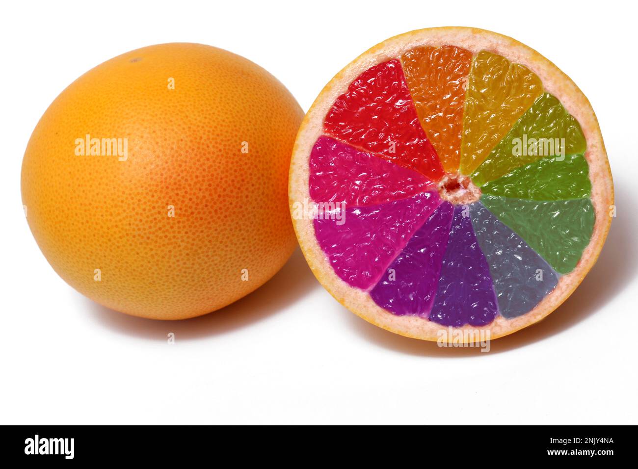 grapefruit (Citrus paradisi), halved grapefruit with fruit pulp rainbow ...