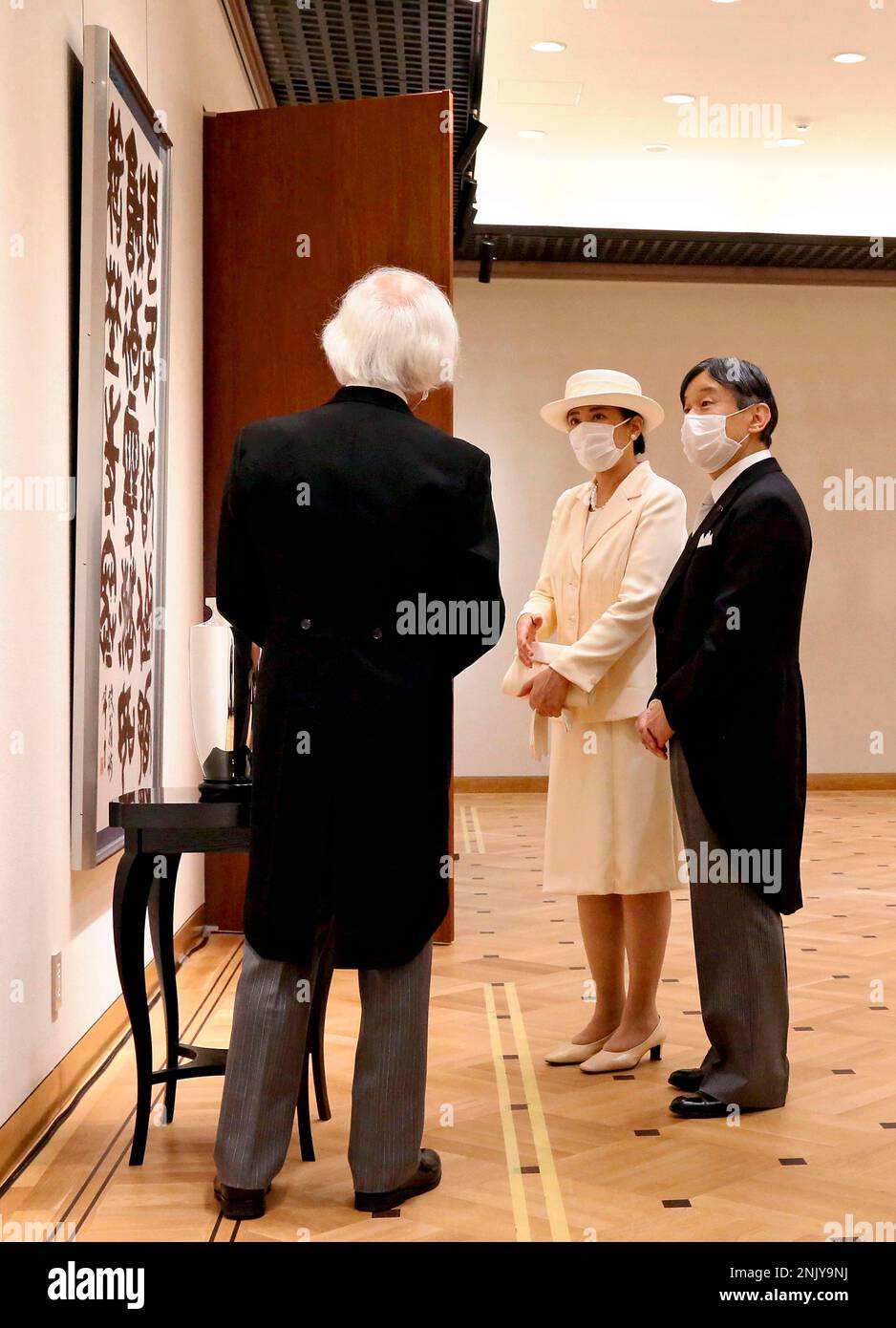 Japanese Emperor Naruhito and Empress Masako admire the winning work of ...