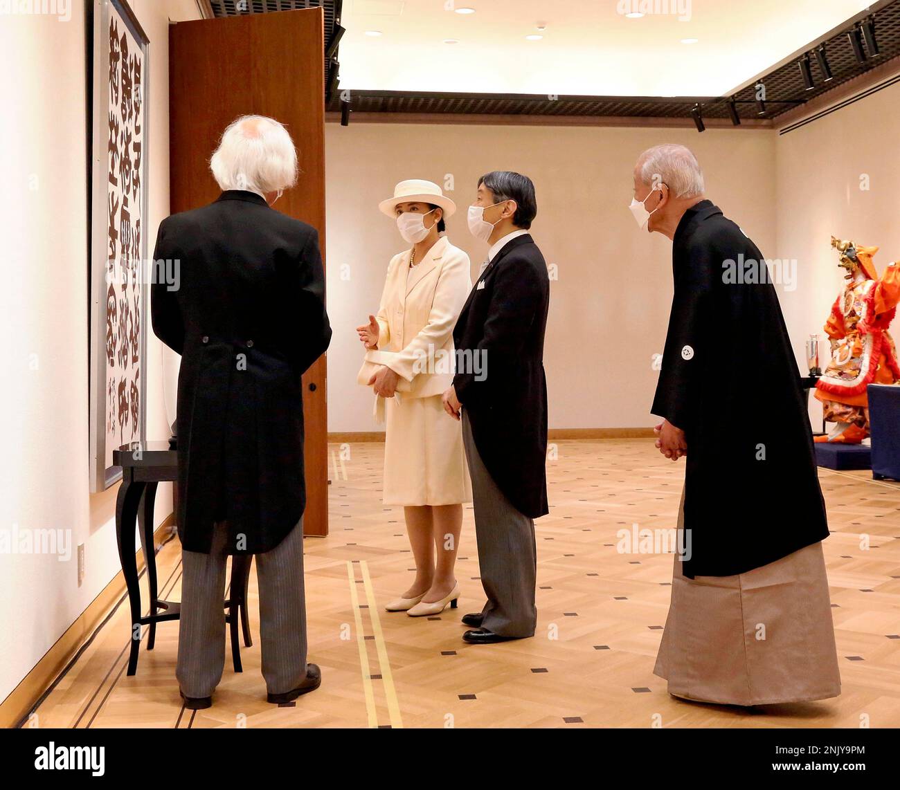 Japanese Emperor Naruhito and Empress Masako admire the winning work of ...