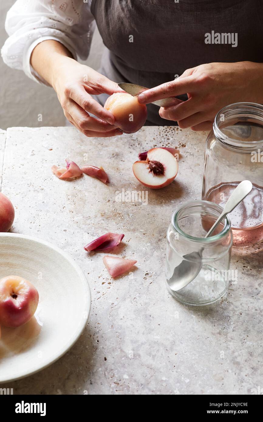 Peach peeling process hi-res stock photography and images - Alamy