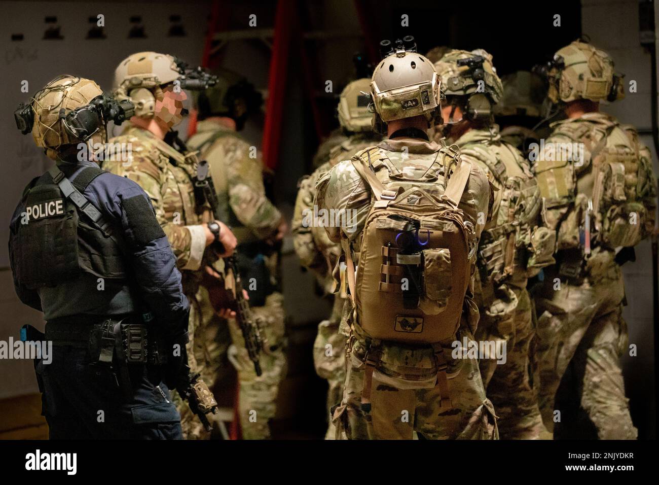 Operators plan their route through additional levels of an enemy ...