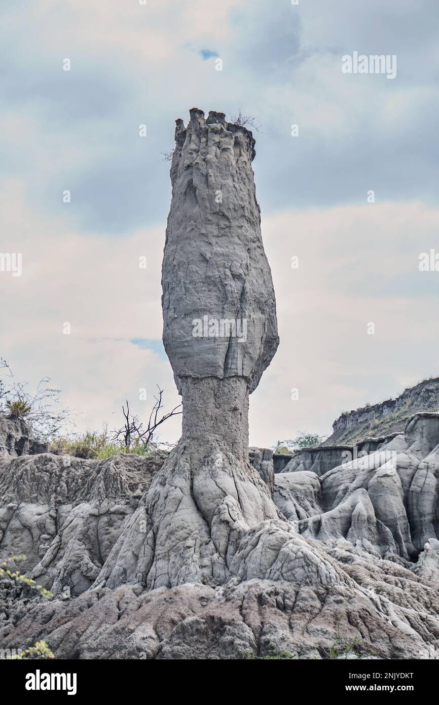 Big rock formation of sandstone against blue cloudy sky and magnificent ...