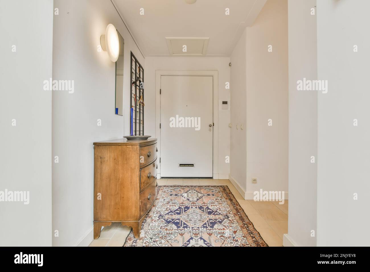 Interior design of light hallway with white walls entrance door and ...
