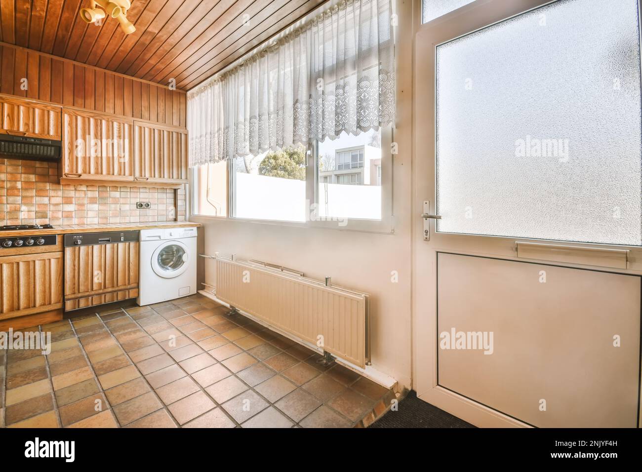 Interior design of rustic kitchen with wooden furniture and modern ...