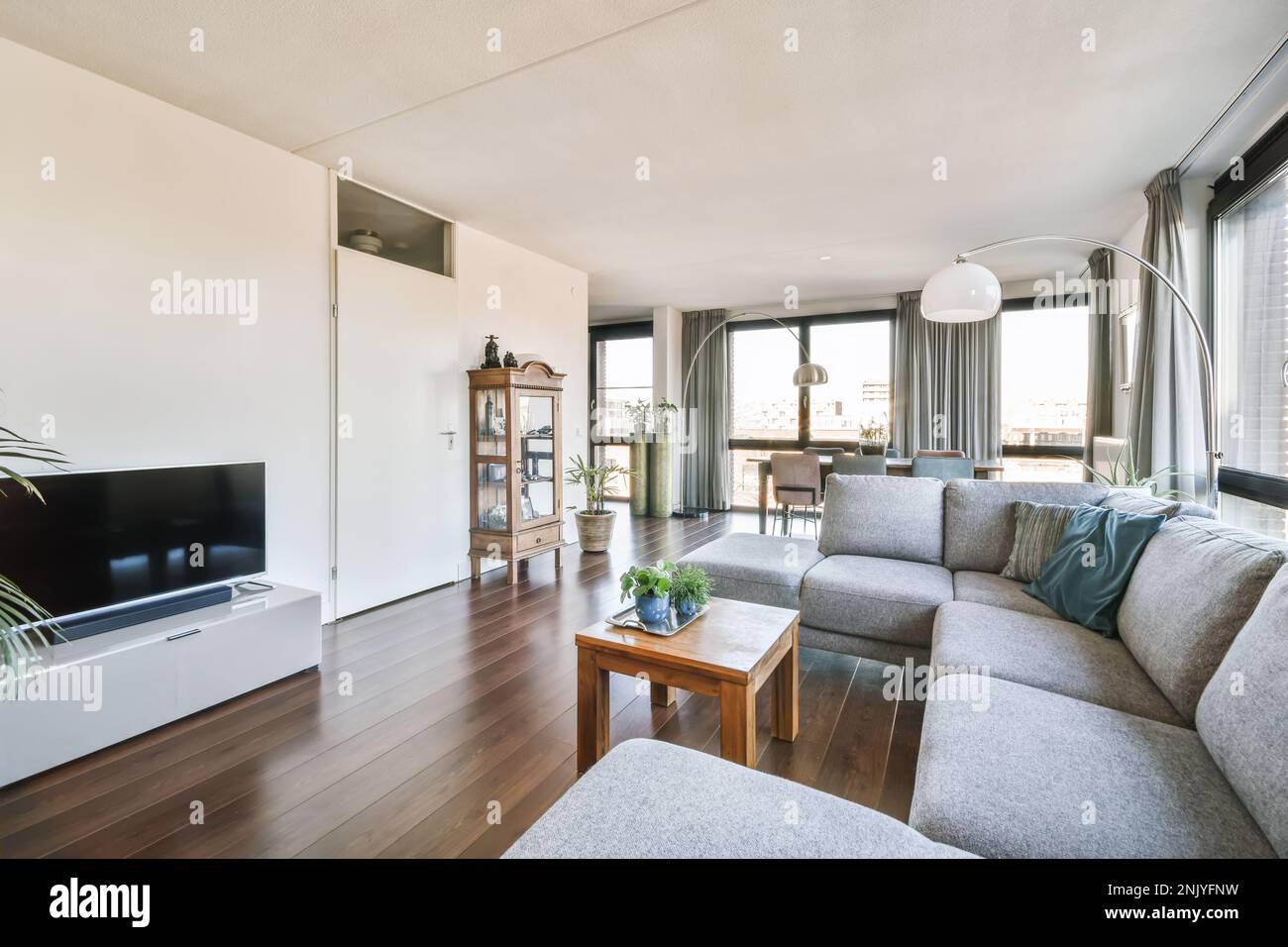 Interior design of spacious living room furnished with comfortable ...