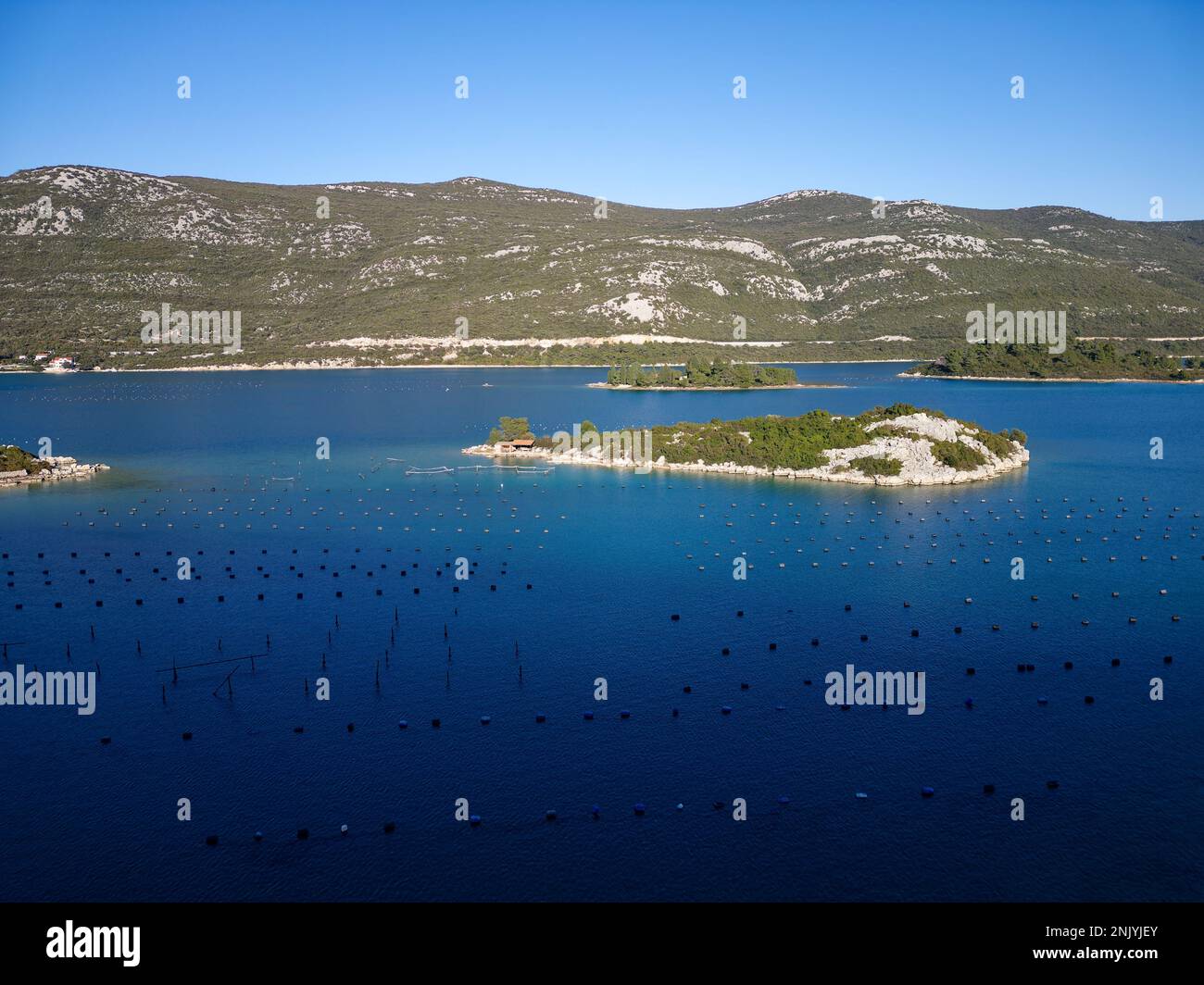 Aerial drone view of the bay of Mali Ston located on Peljesac peninsula ...