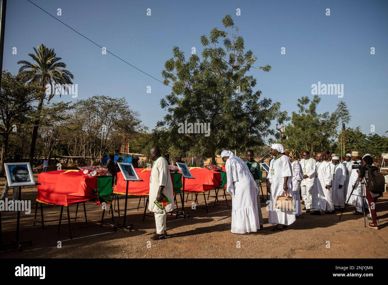 People attend the reburial ceremony of Burkina Faso's revolutionary ...