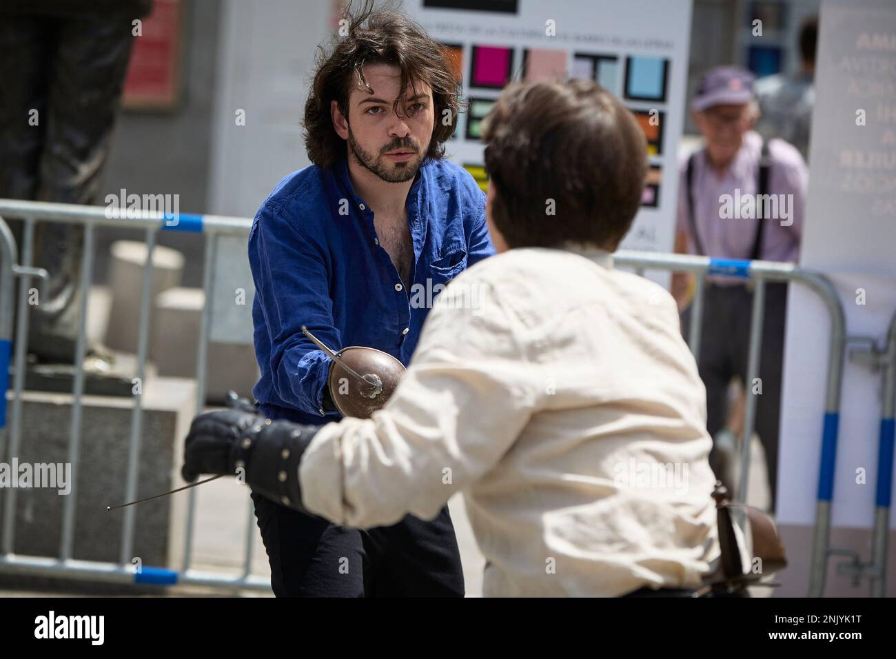 Two fencers practice a bout during a fencing exhibition in the Plaza de ...