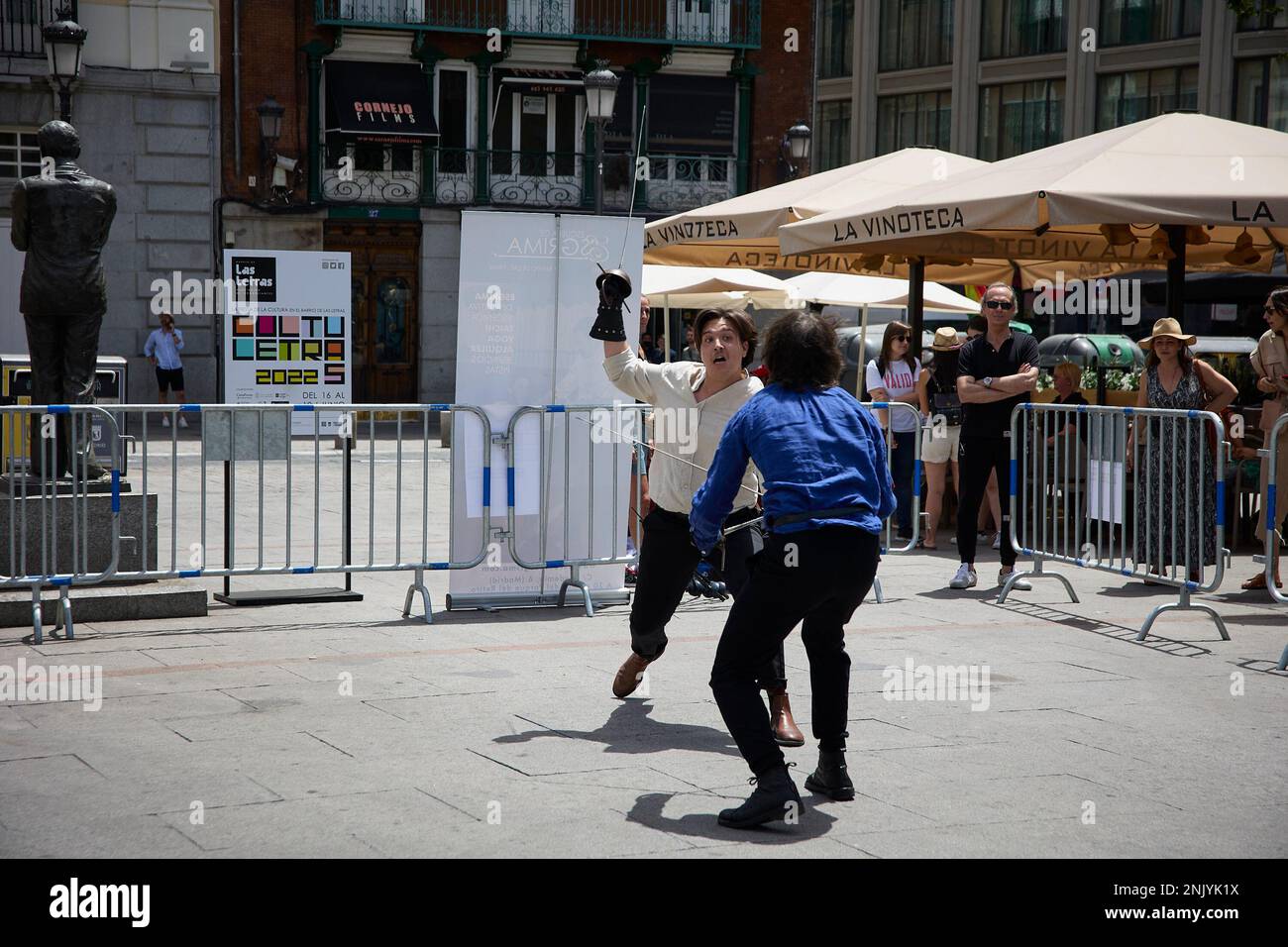 Two fencers practice a bout during a fencing exhibition in the Plaza de ...