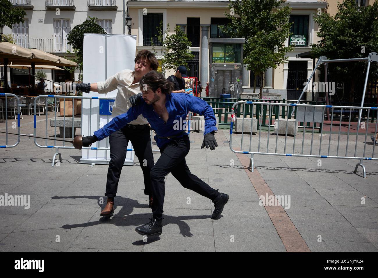 Two fencers practice a bout during a fencing exhibition in the Plaza de ...