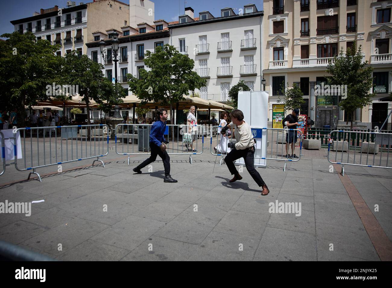 Two fencers practice a bout during a fencing exhibition in the Plaza de ...