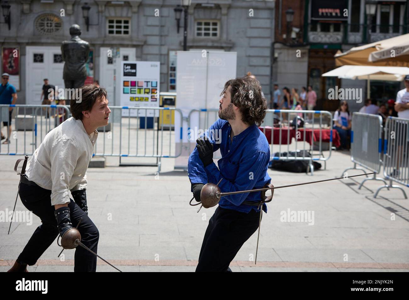 Two fencers practice a bout during a fencing exhibition in the Plaza de ...