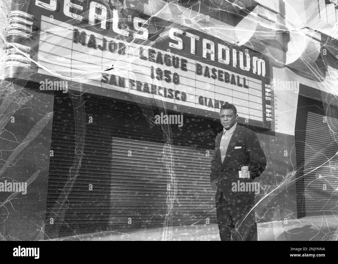 Willie Mays poses in front of Seals Stadium during an October 31, 1957 ...