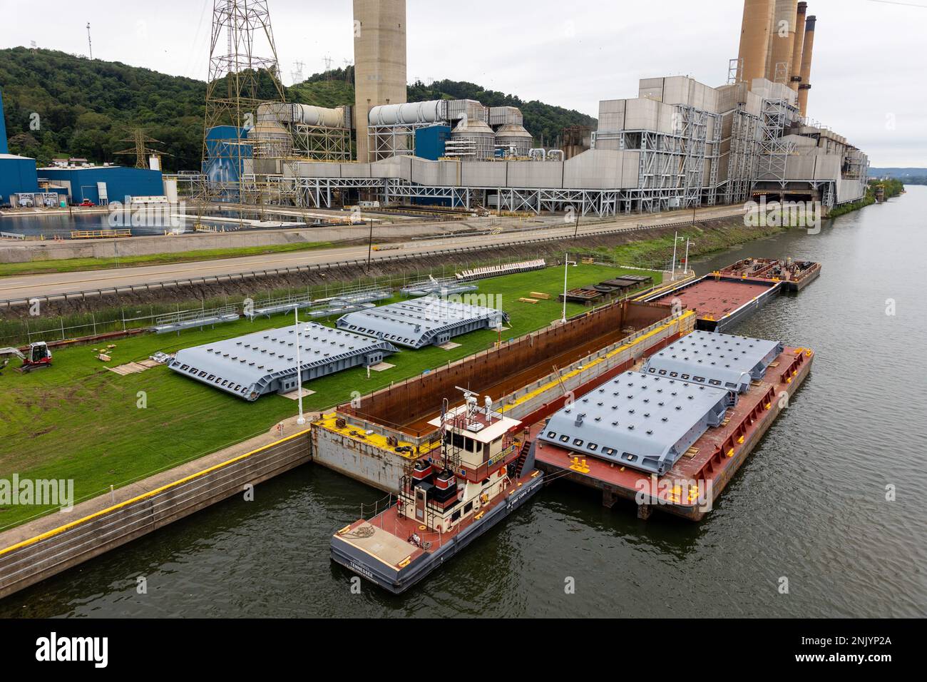 The upstream and downstream miter gates are staged for install at the ...