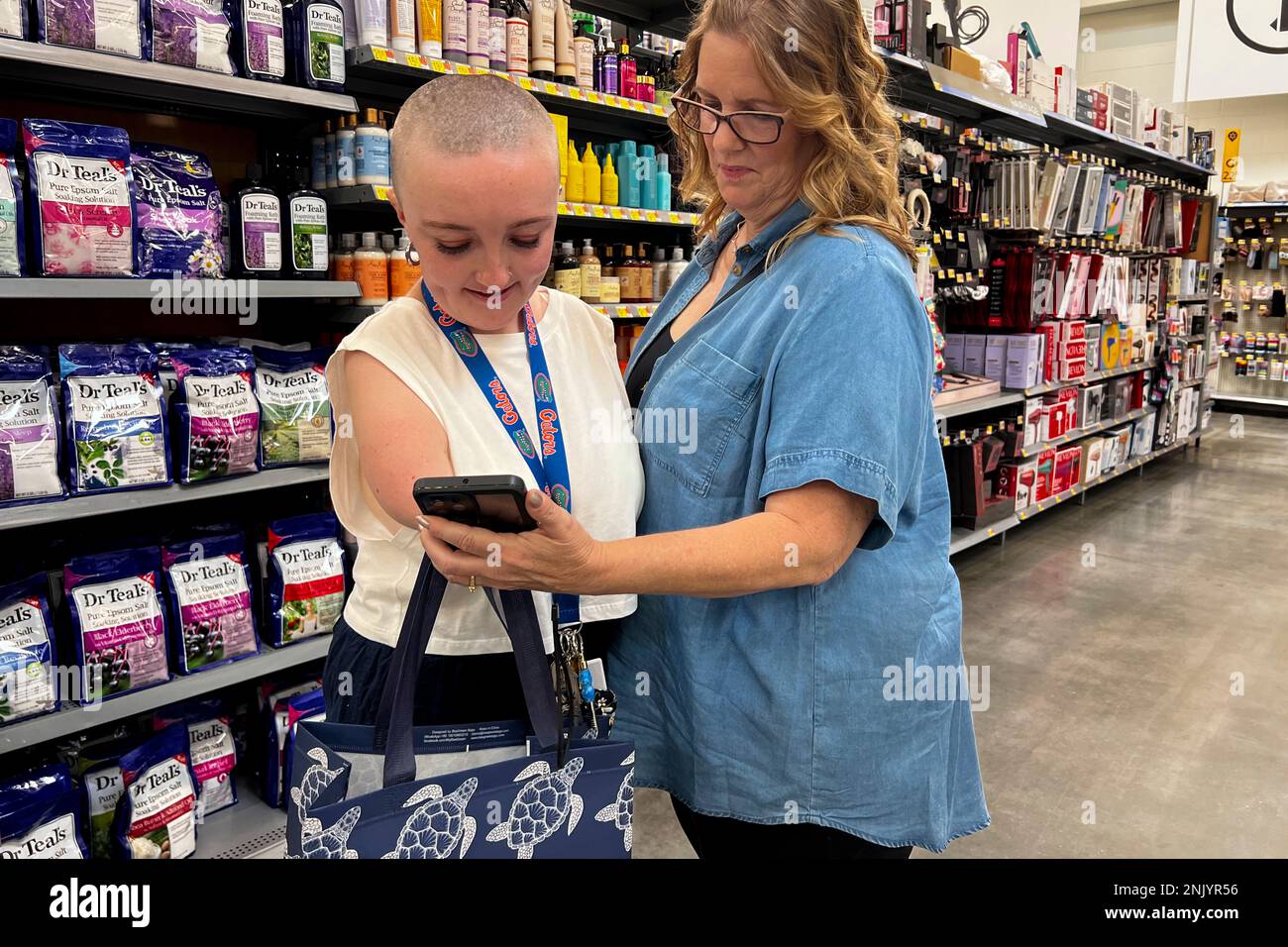 Emily Rowley, 20, and her mother, Patty Rowley, prepare to film a ...