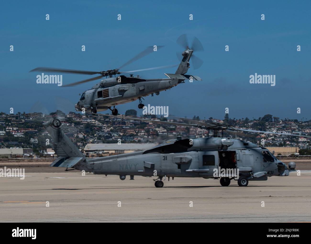 An MH-60R Sea Hawk helicopter assigned to the “Seahawks” of Helicopter ...