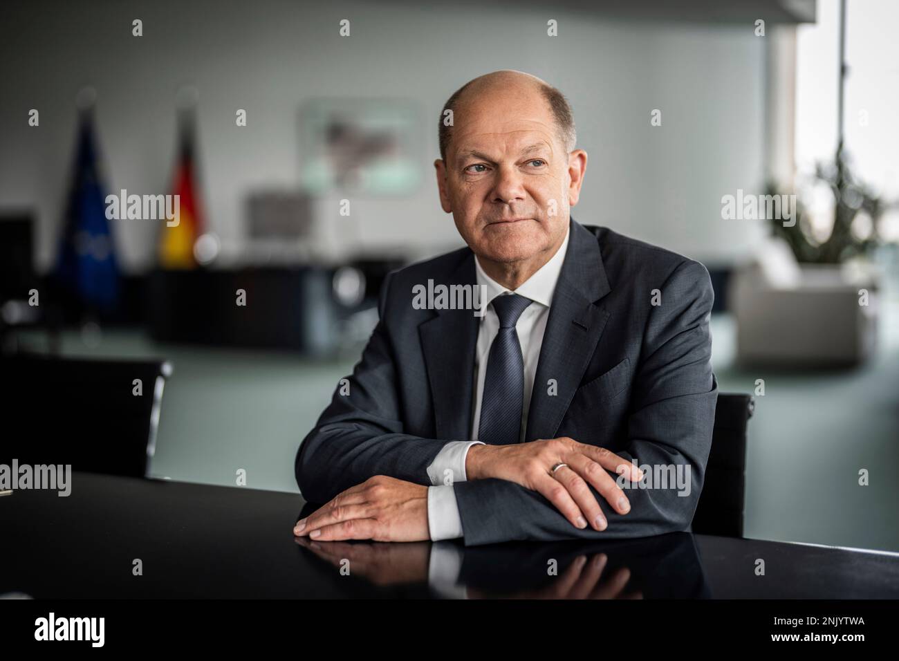 German Chancellor Olaf Scholz poses during an interview in his office ...