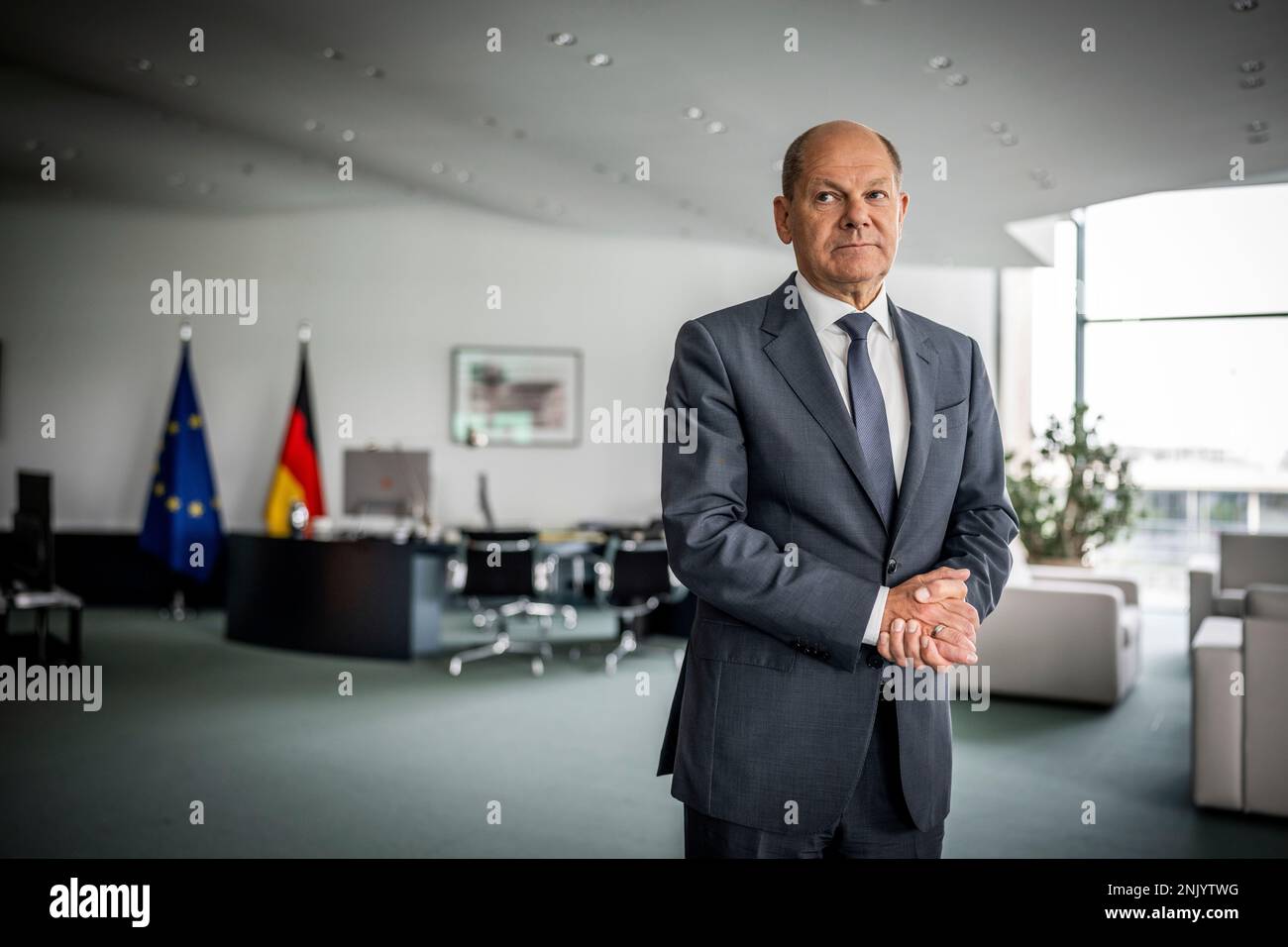 German Chancellor Olaf Scholz poses during an interview in his office ...
