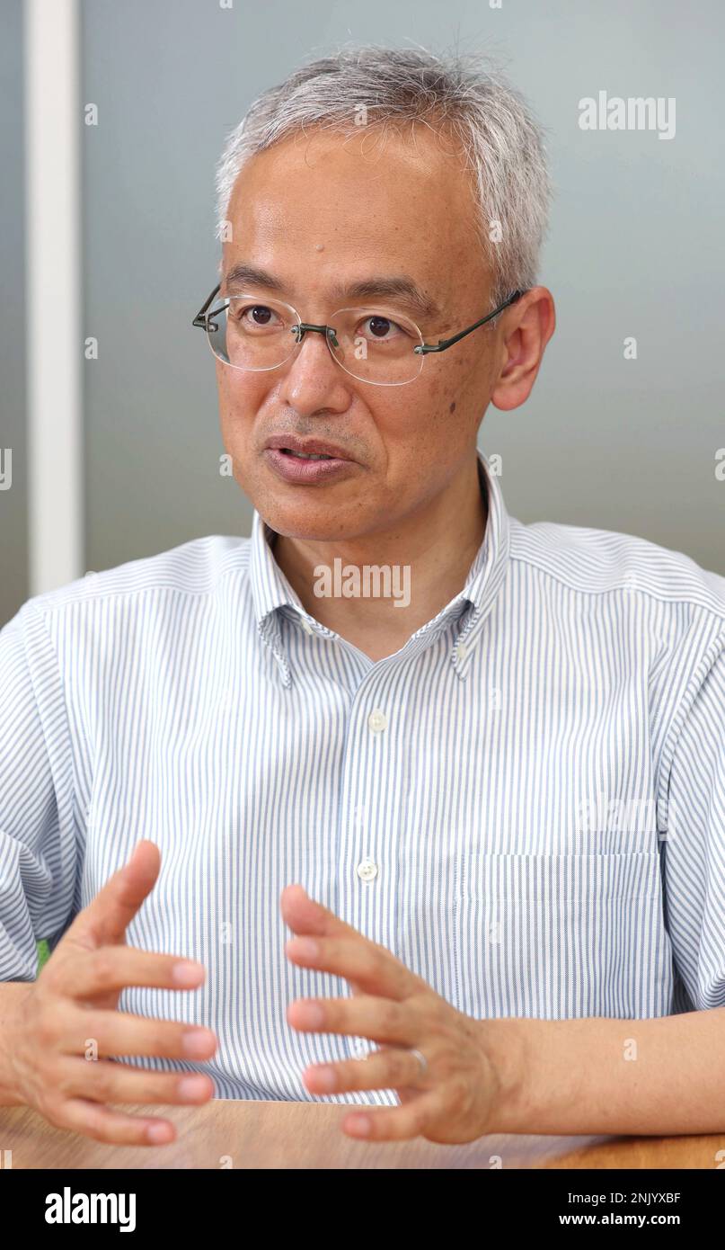 Japanese physicist Yasunobu Nakamura poses for photo during an ...