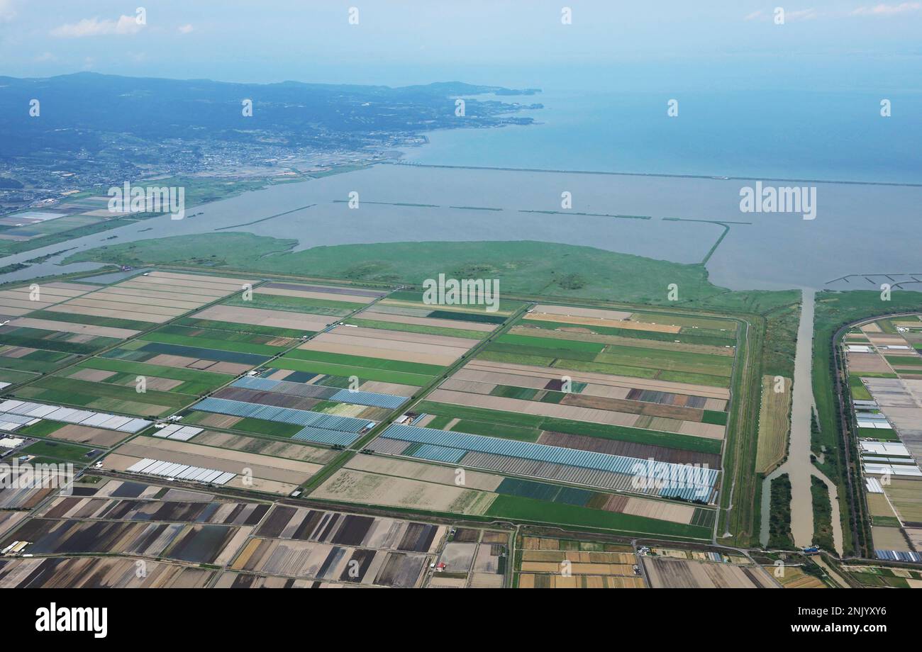 An aerial photo shows the reclaimed land at Isahaya Bay and tide ...