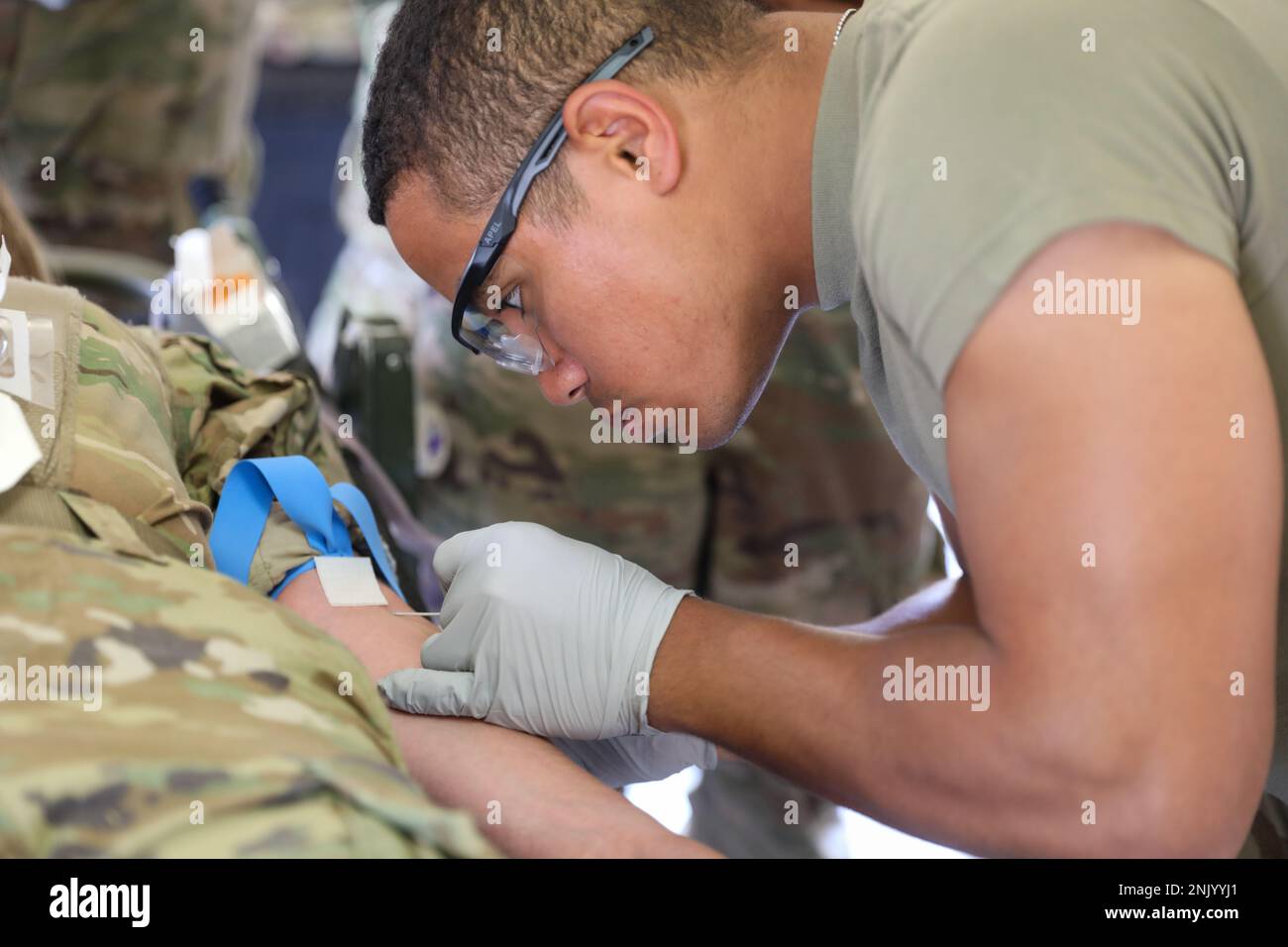 U.S. Army Spc. Alexis Sully, assigned to 64th Brigade Support Battalion ...