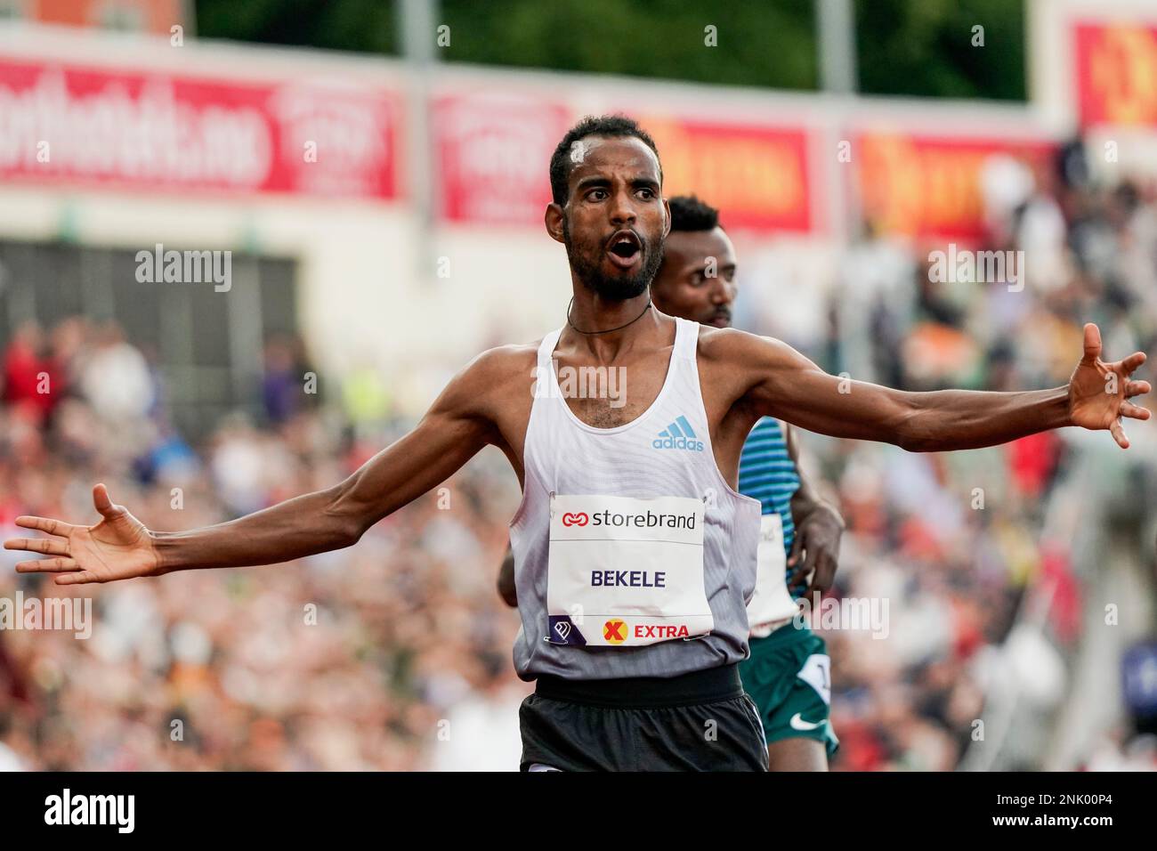 Telahun Haile Bekele from Ethiopia reacts in the men's 5000m during the ...
