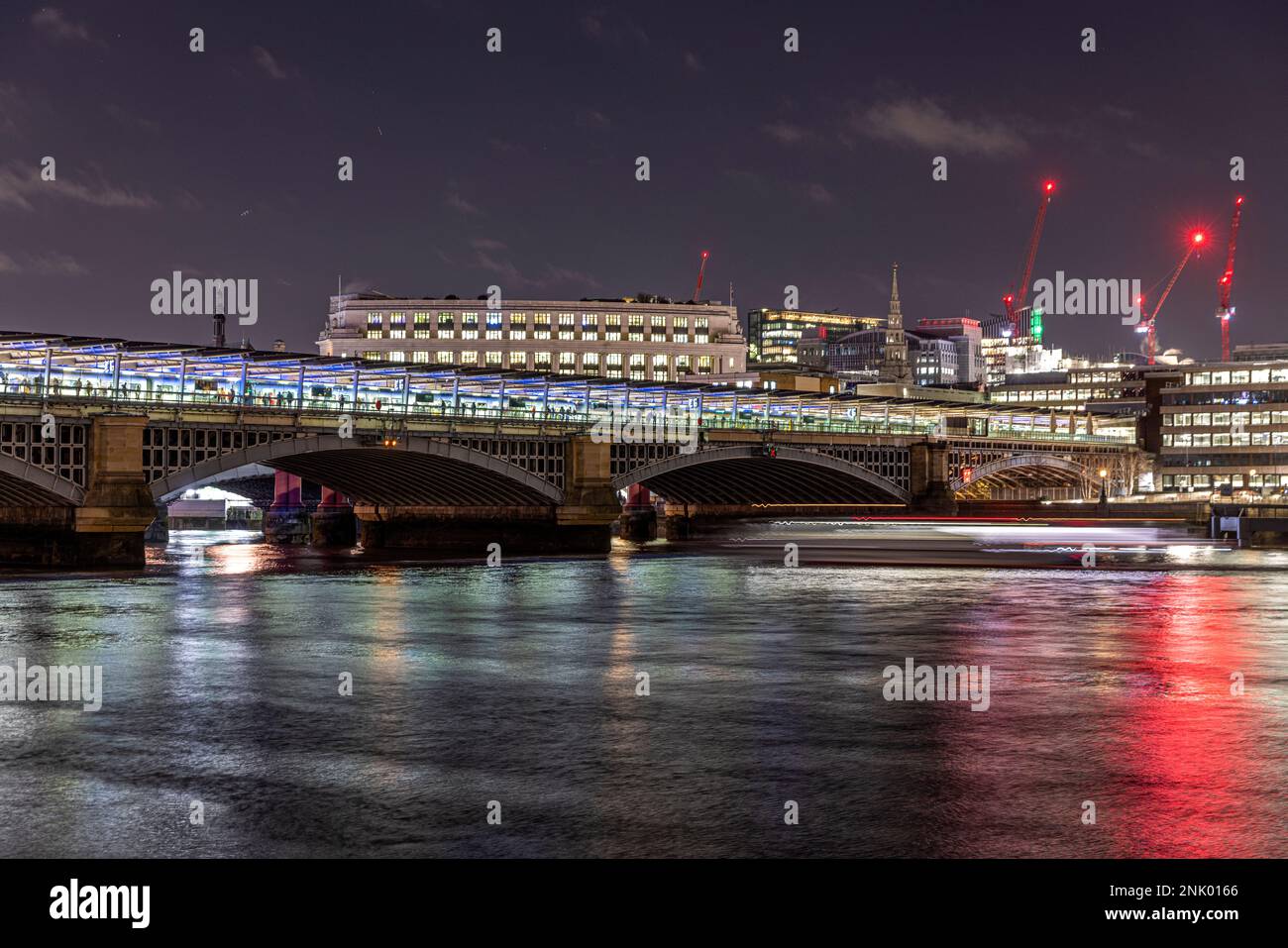 River Thames and Blackfriars railway bridge at night, London, England ...