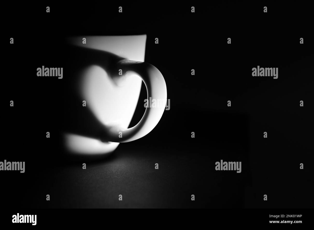 Coffee cup in shape Black and White Stock Photos & Images - Alamy