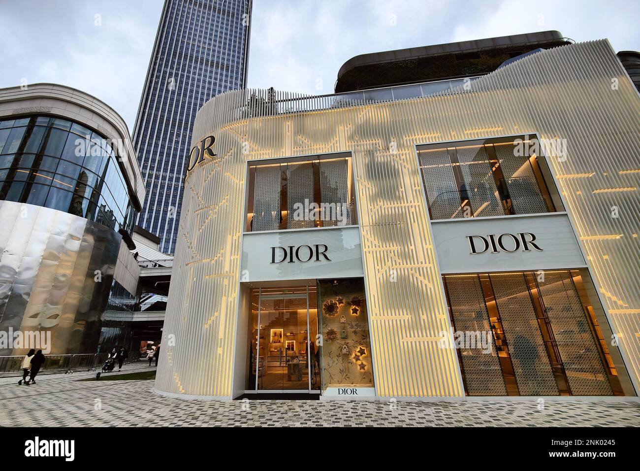 SHANGHAI, CHINA - FEBRUARY 23, 2023 - Pedestrians walk past DIOR store ...