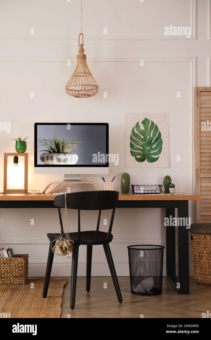 Modern workplace with computer in room. Interior design Stock Photo - Alamy