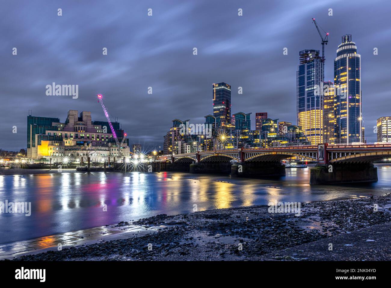 River Thames at low tide, Vauxhall Bridge, MI6 building and towers ...