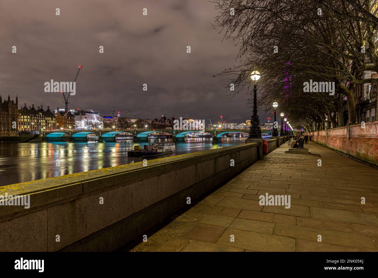 Westminster Bridge and the River Thames embankment at night, London ...