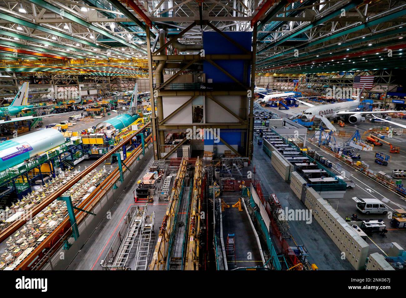 The 777 factory line, left, is seen next to the 787 line, right, at ...