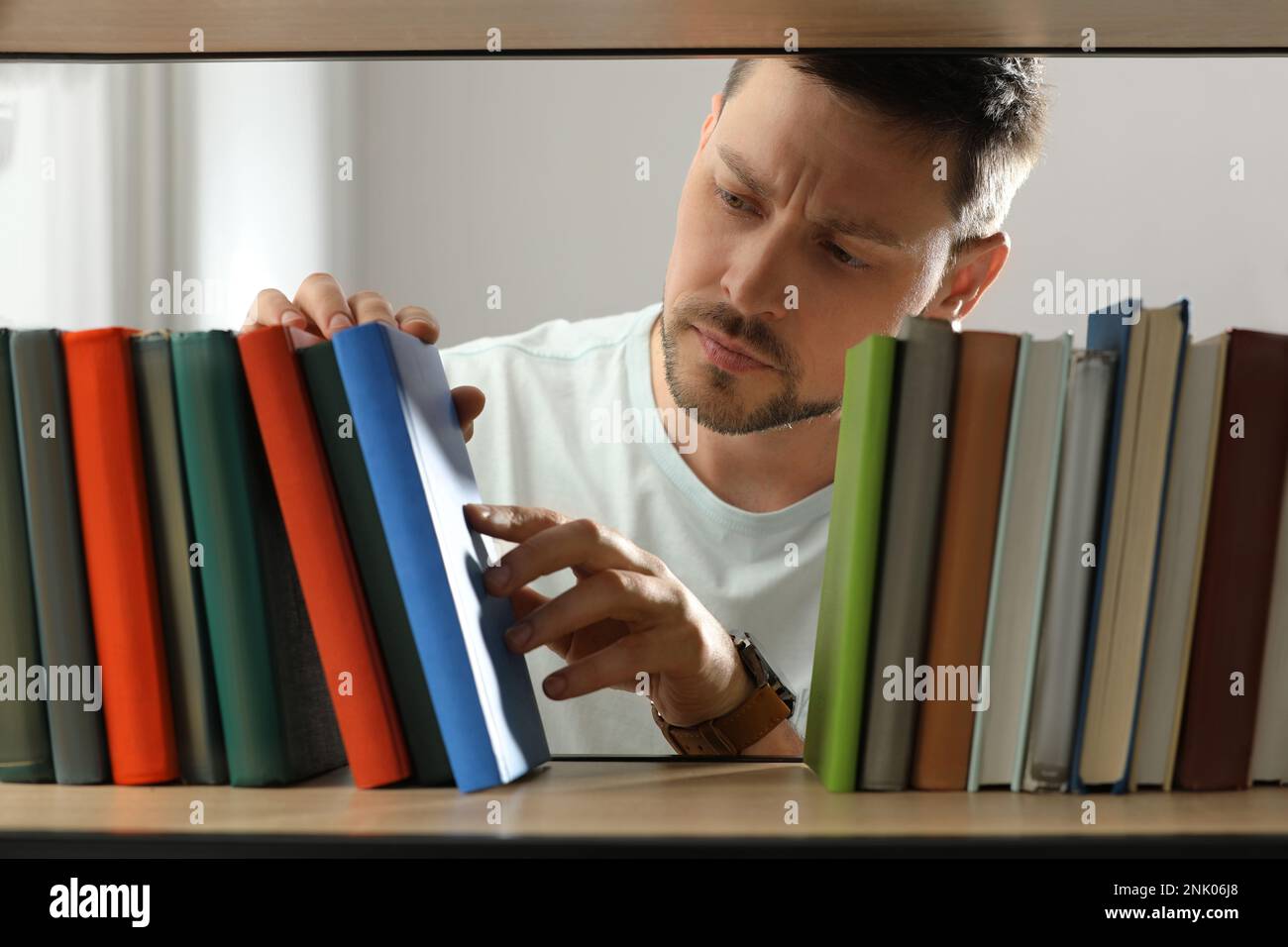 College library male student searching hi-res stock photography and ...