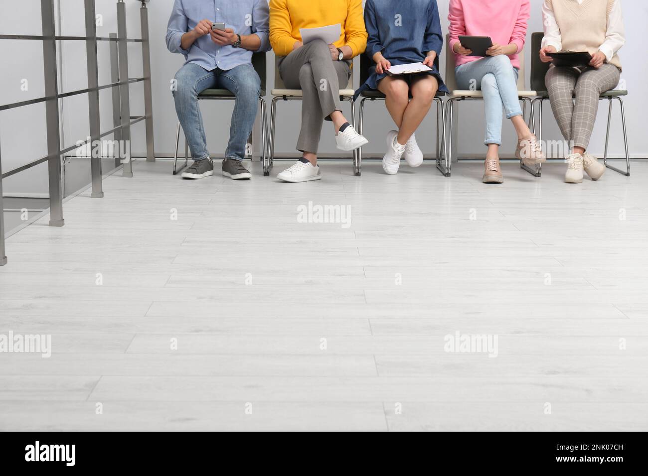 People waiting for job interview in office hall, closeup Stock Photo ...