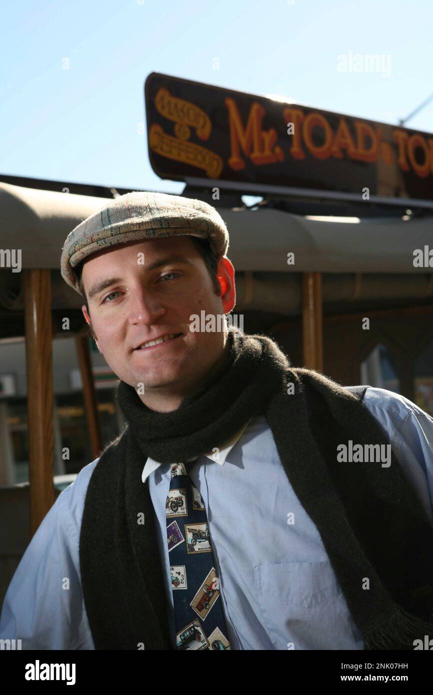 Charles Lundquist, 25, who runs Mr. Toad's Vintage Car Tours stands with his 1912 Rambler at ...