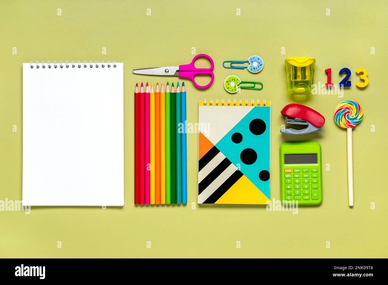 Frame from school and office supplies Paper clips, pens, calculator ...