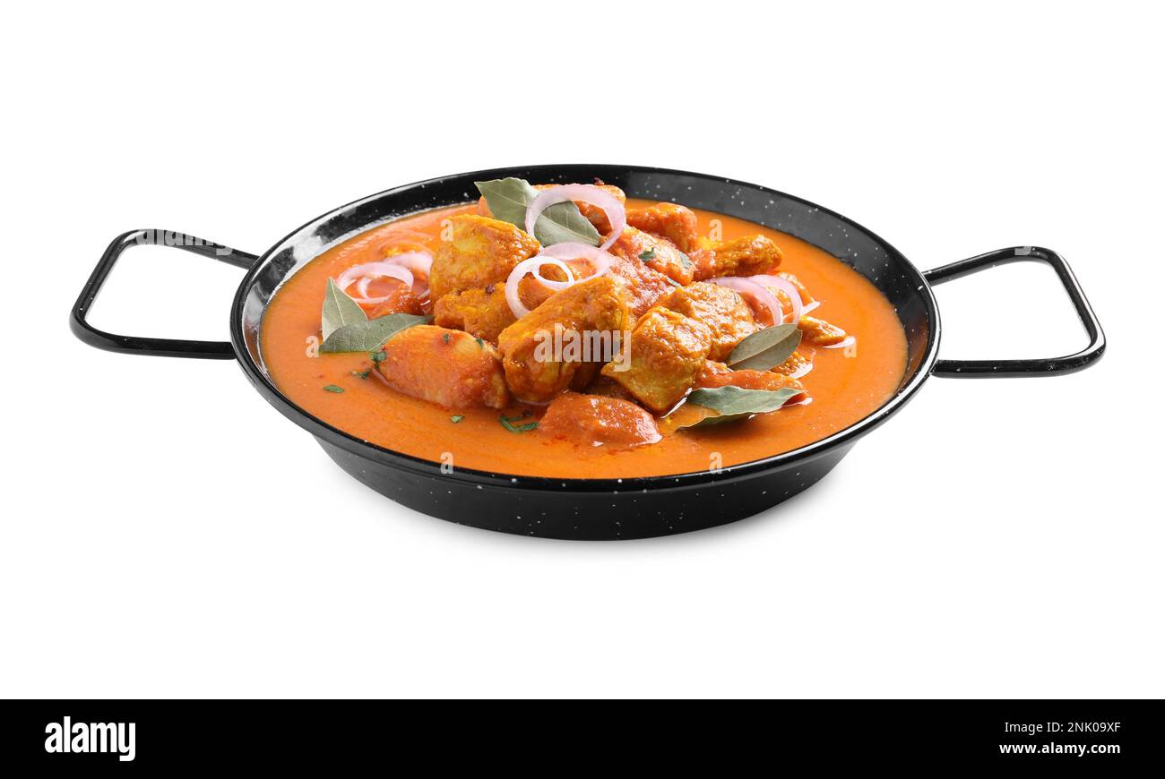 Delicious chicken curry in pan on white background Stock Photo - Alamy