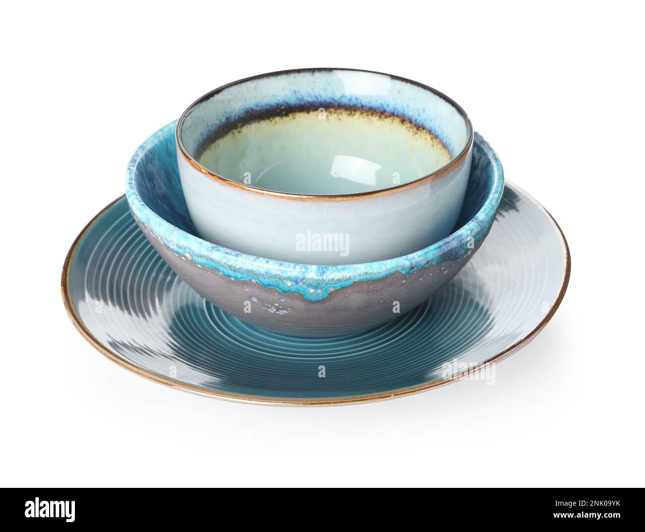 Stack of clean dishes on white background Stock Photo - Alamy