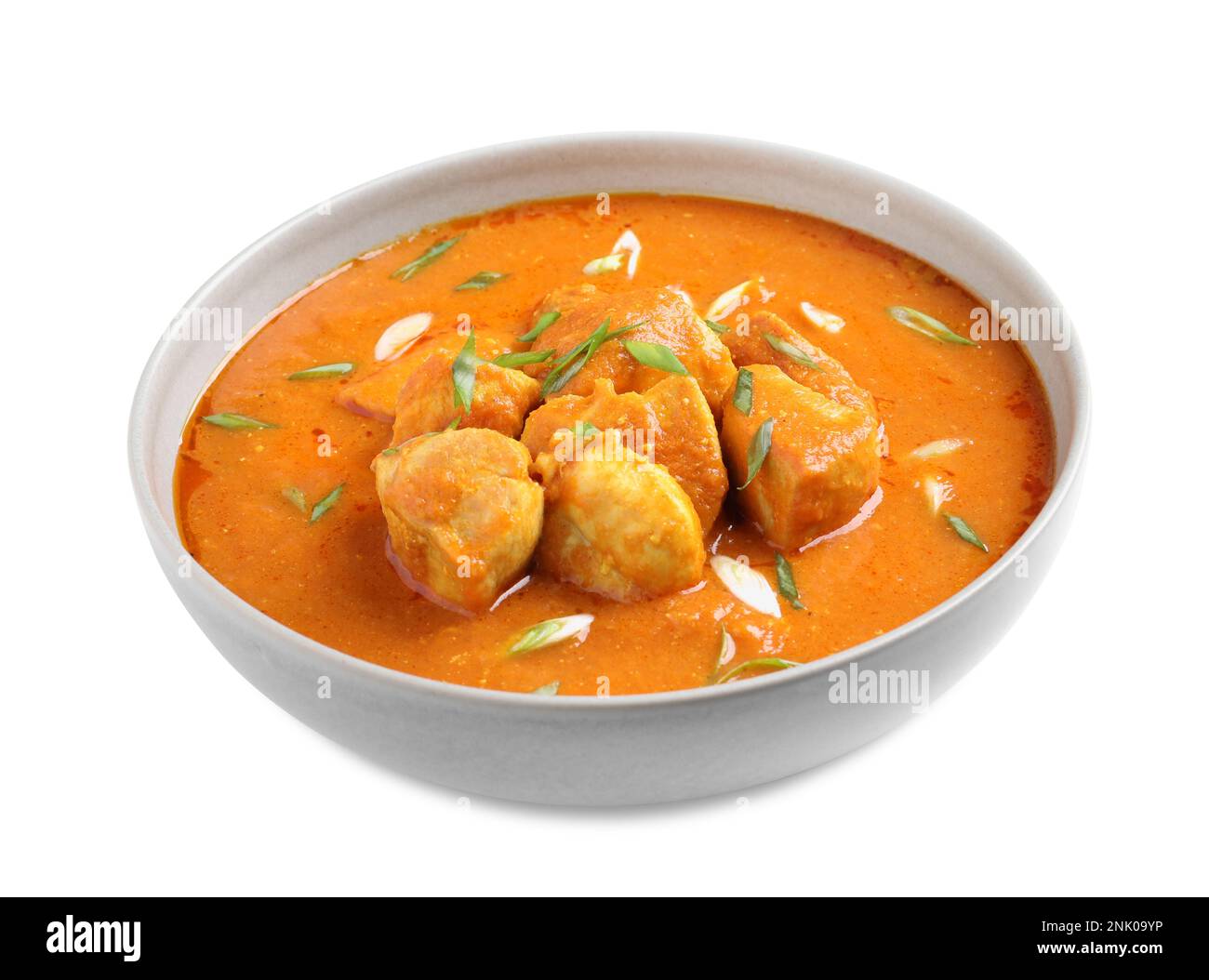Bowl of delicious chicken curry on white background Stock Photo - Alamy