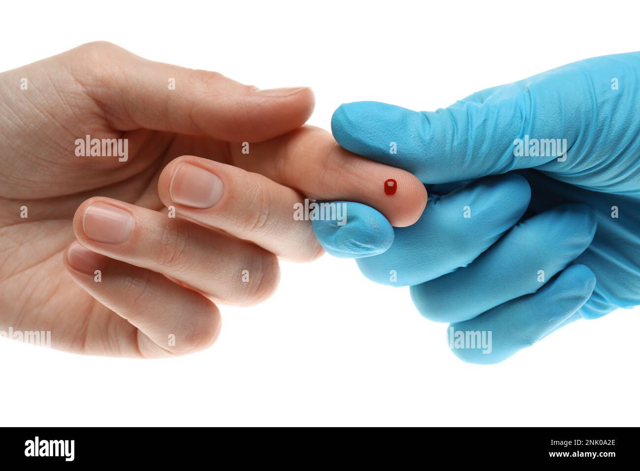 Doctor taking blood sample from patient's finger on white background ...