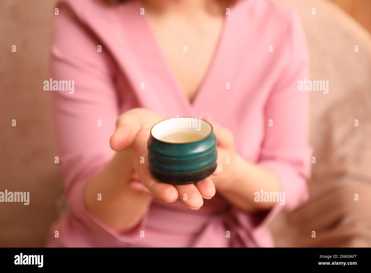 Offering cup hi-res stock photography and images - Alamy