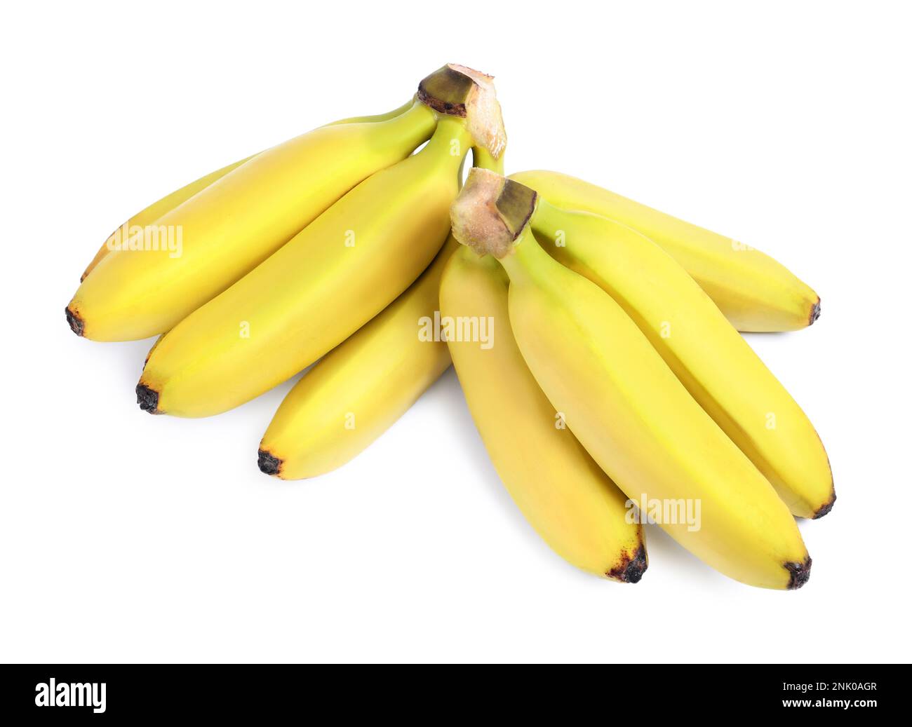 Clusters of ripe baby bananas on white background Stock Photo - Alamy