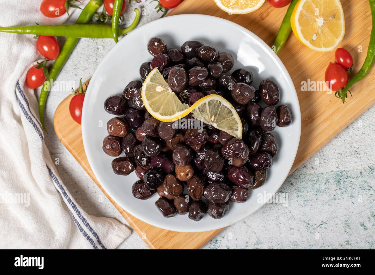 Group olives on wooden hi-res stock photography and images - Alamy