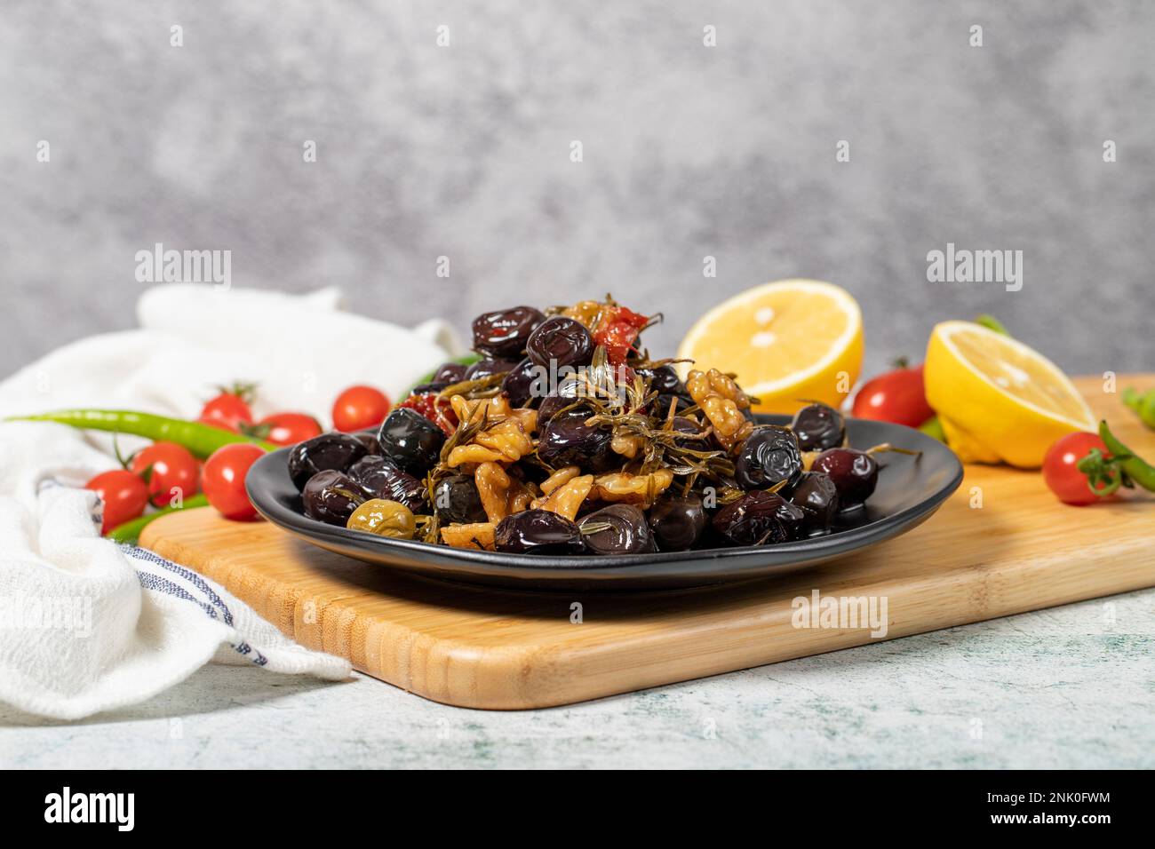 Mixed black olives. Special mixed olives prepared with dried red pepper ...