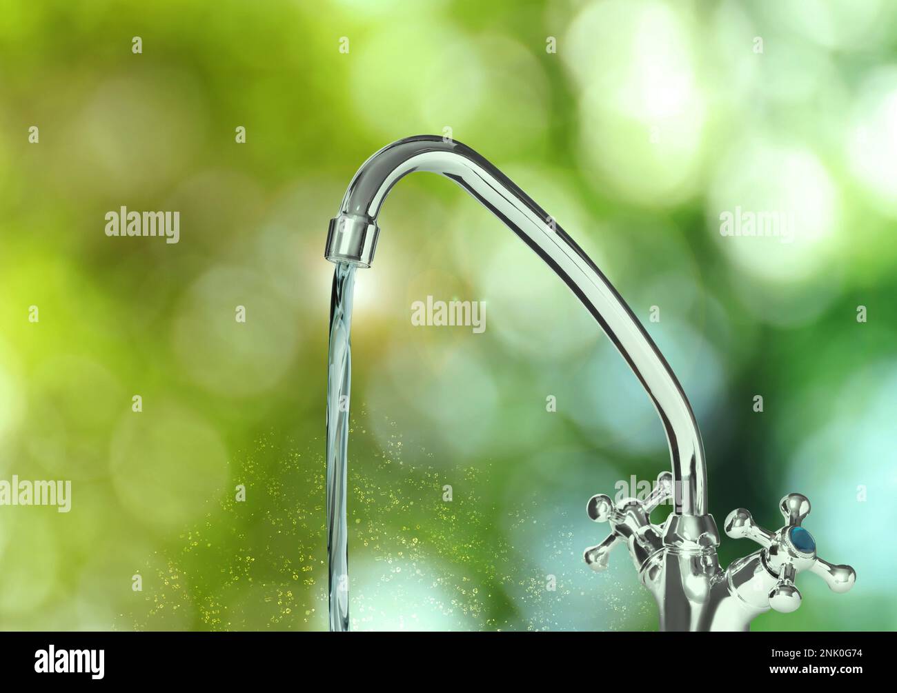 Water flowing from tap outdoors on sunny day, bokeh effect Stock Photo ...